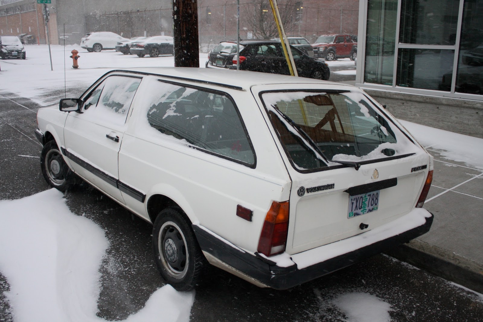 OLD PARKED CARS.: 1988 Volkswagen Fox wagon.