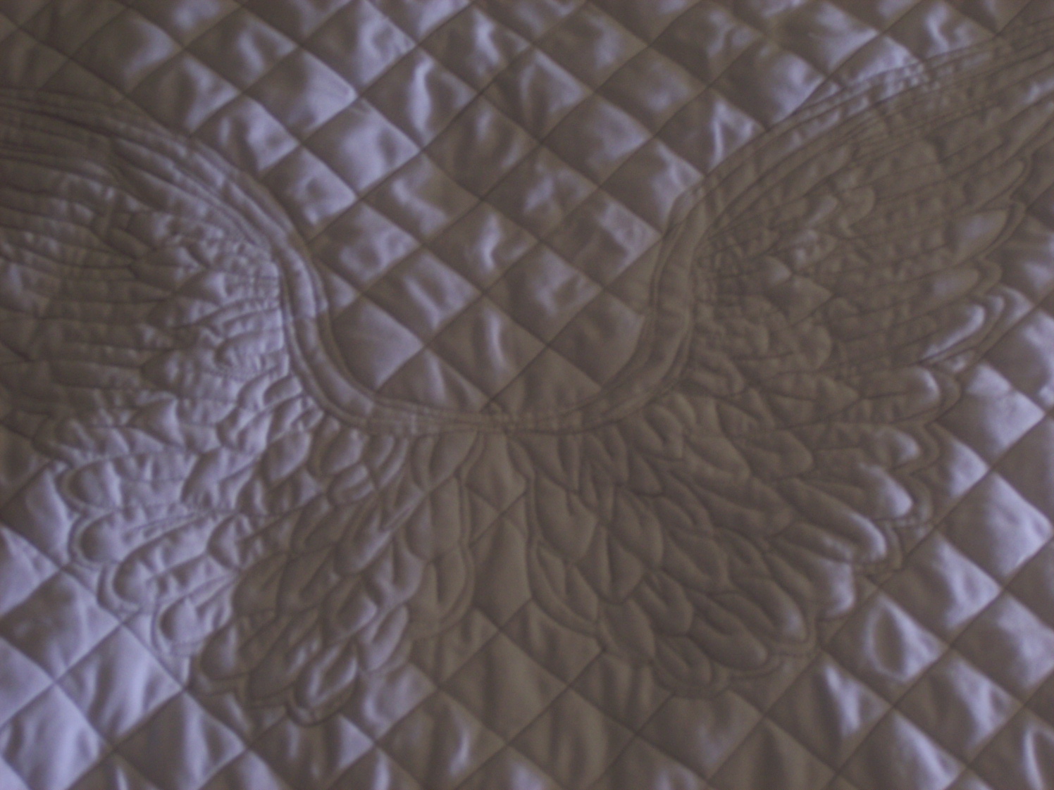 NinePatch's Quilty World: Angel Wing quilt is done