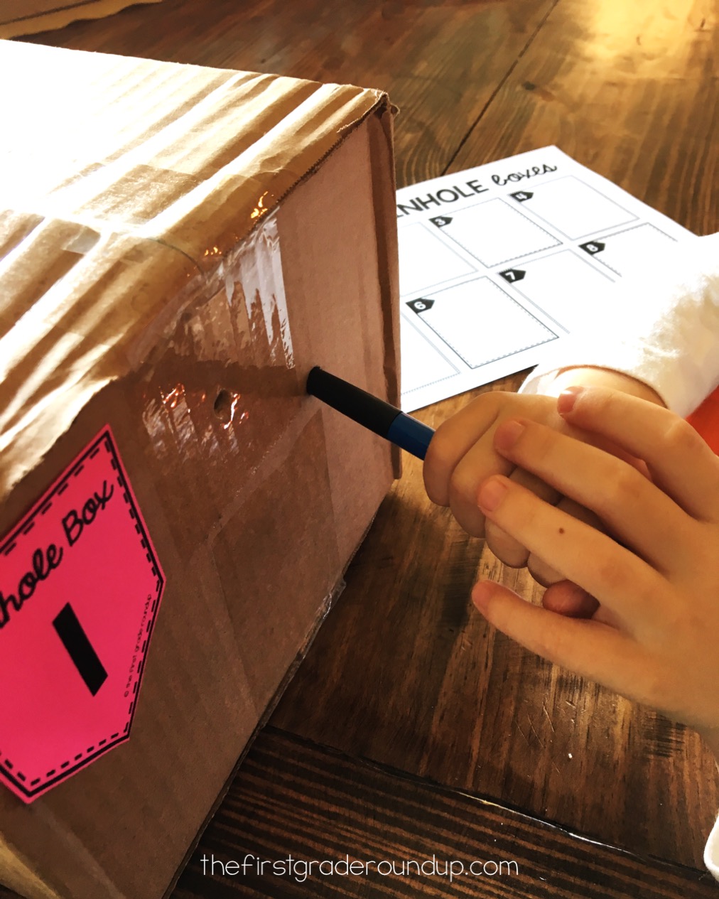 pinhole light box STEM challenge for first grade - The First Grade Roundup