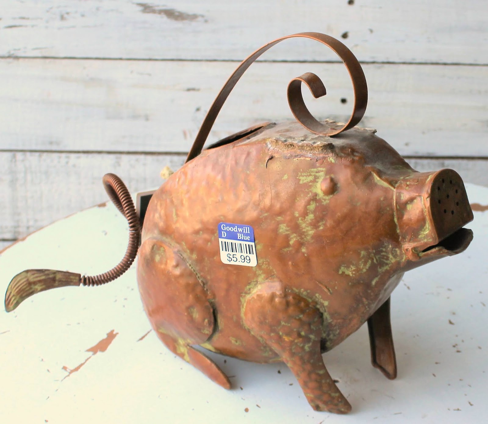 Up-cycling An Ear-less Goodwill Pig Watering Can - Organized Clutter