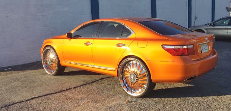 Ace-1: Candy Orange Lexus LS460 on 28" DUB Twstd Floaters