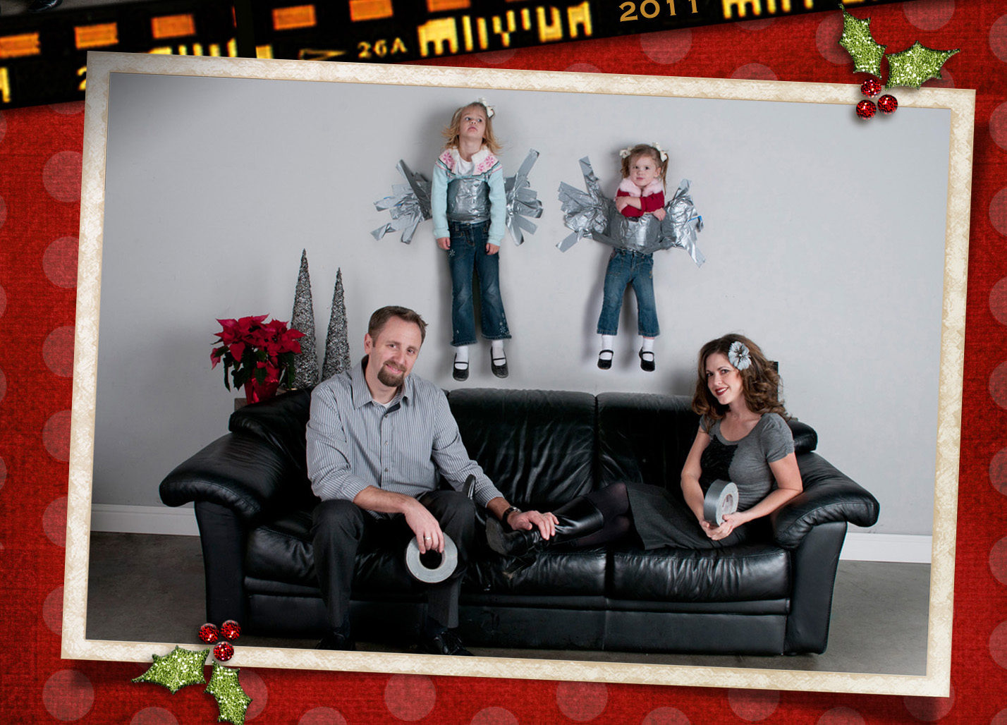 Life at the White House: Kids taped to wall Christmas Card...