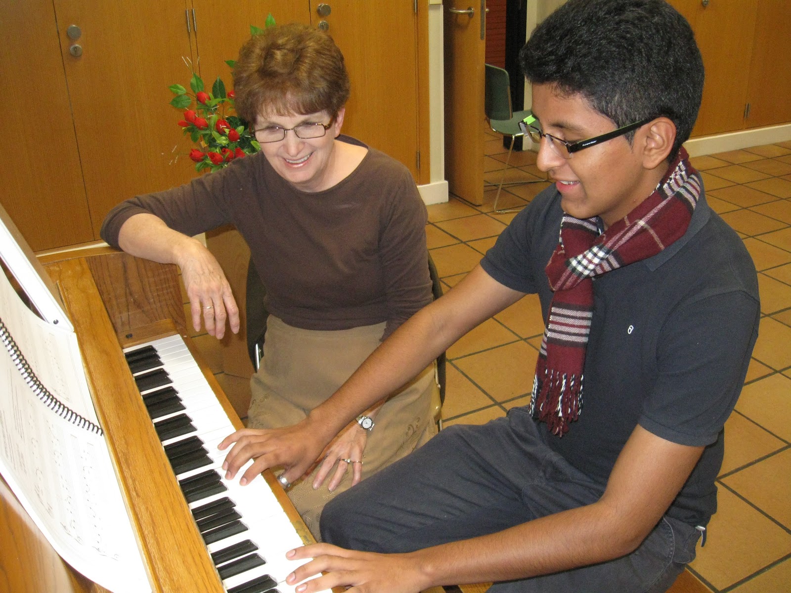 LDS Missionary Couple in the Madrid Spain Temple: Teaching Piano Lessons