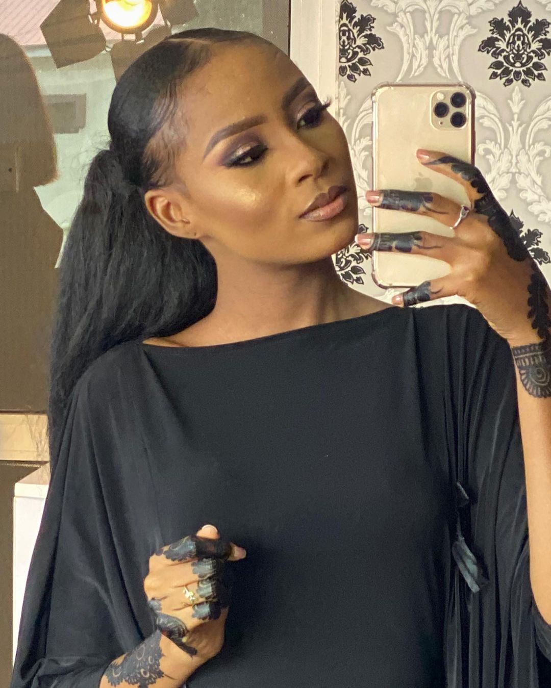 Hyena Tattoo : Maryam Booth likes to wear Hyena Tattoo designs.