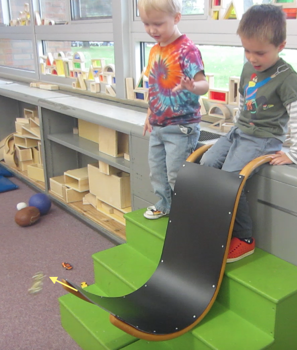 SAND AND WATER TABLES: Rocking chair car ramp