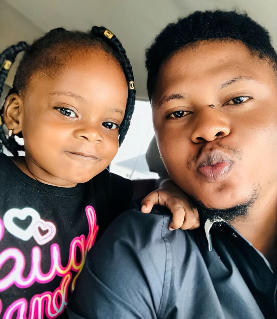 Photos of Shoneye Olamilekan Show and his daughter, Olamiotan
