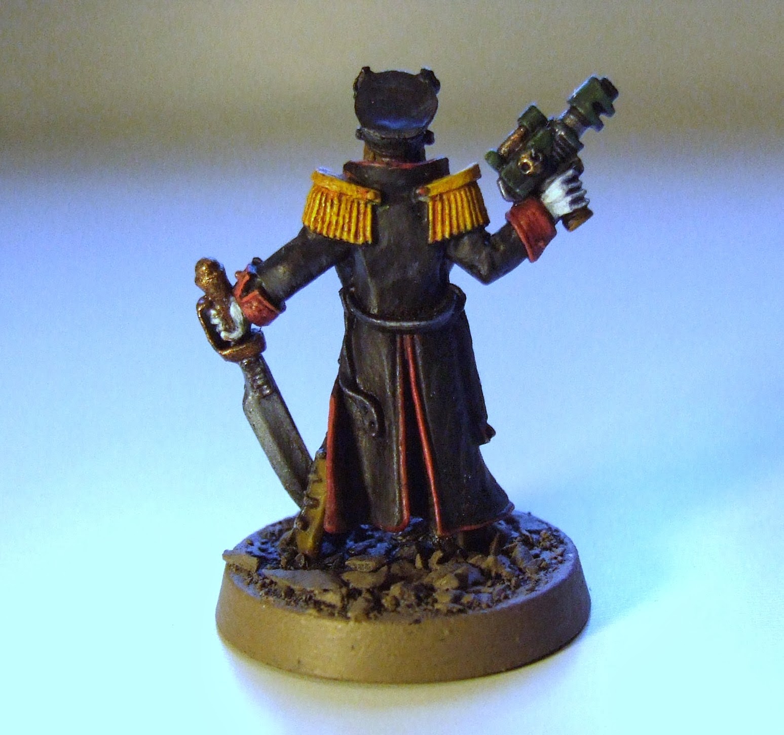 Female Imperial Guard commissar model painted - Wargaming Hub