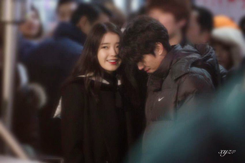 IU's handsome manager and the look she gives her bodyguard