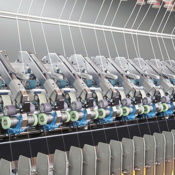 Compact Spinning Process