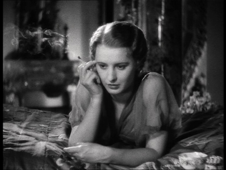 Film Noir Photos: Smoking in Bed: Barbara Stanwyck