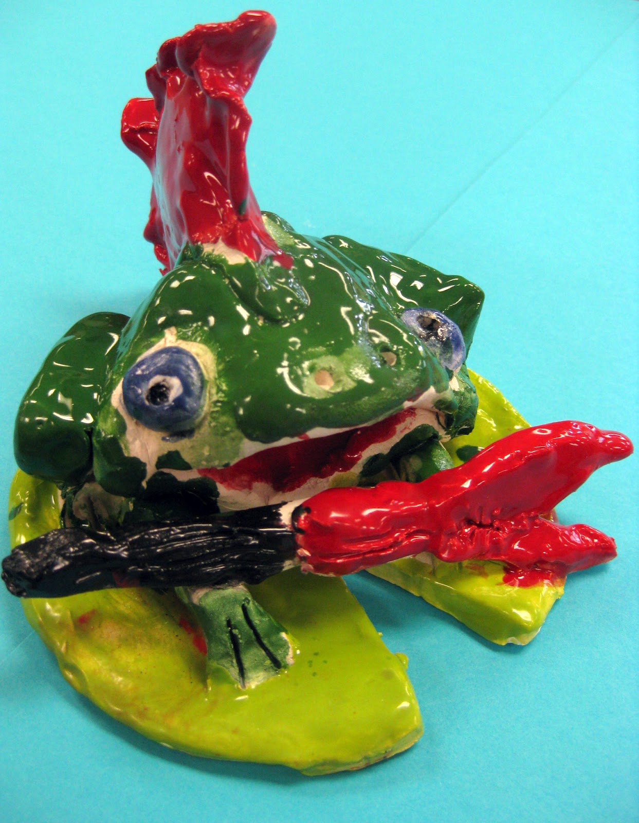 Cassie Stephens: clay frogs