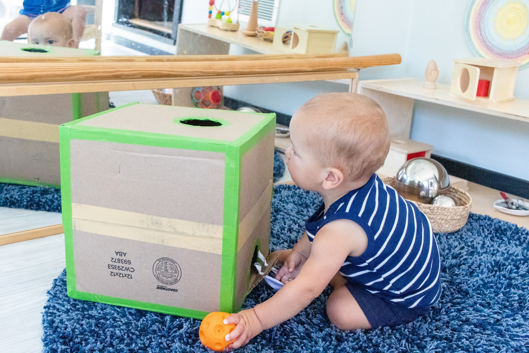 A Giant Montessori Object Permanence Box DIY