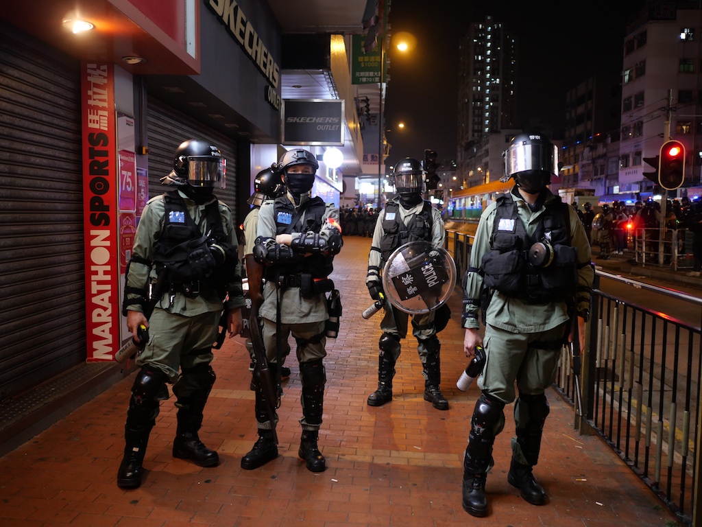 Momentarily Raising the Pepper Spray Canisters in Yuen Long, Hong Kong ...