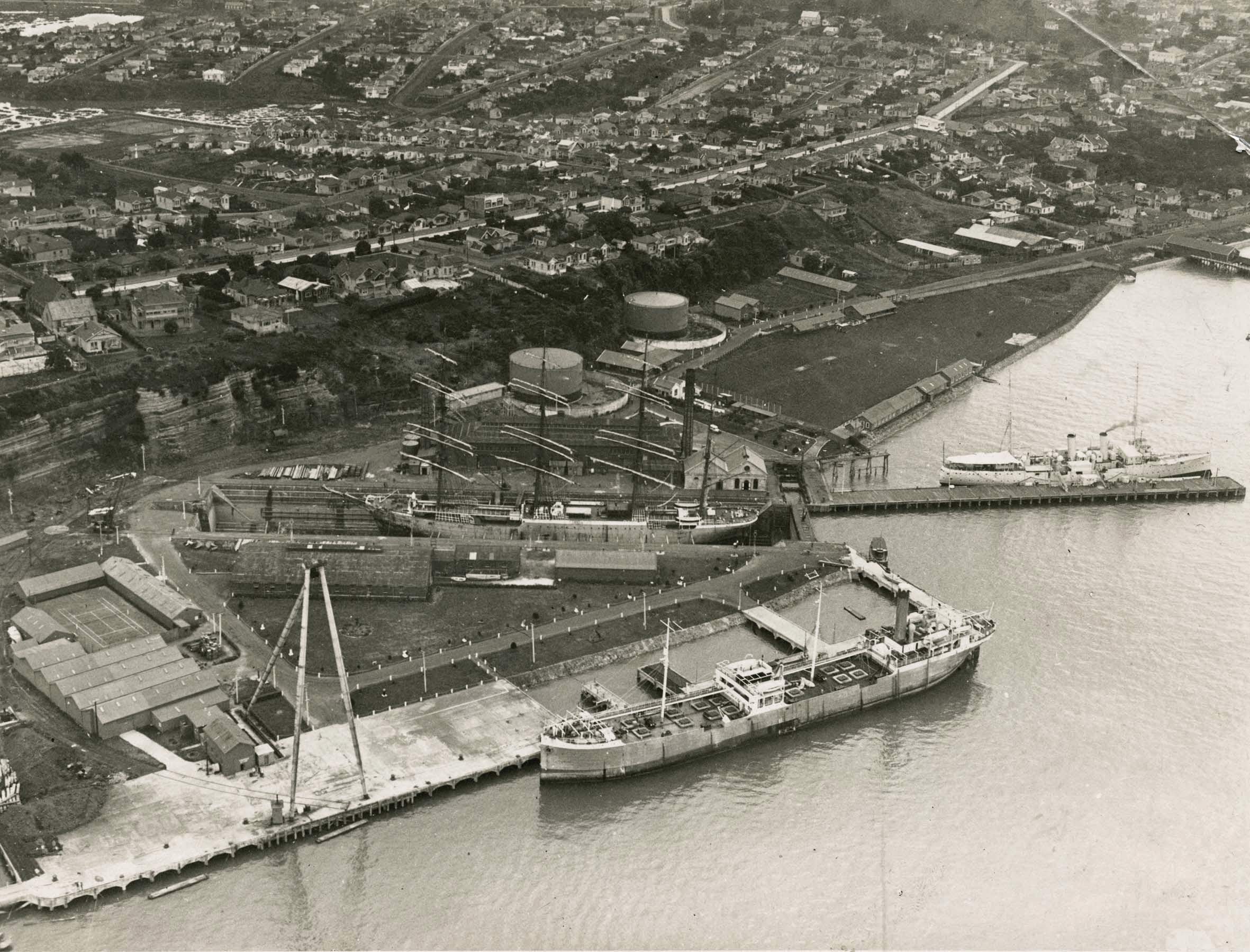 HMS Philomel at the Training Jetty and RFA Nucla (oiler) alongside ...