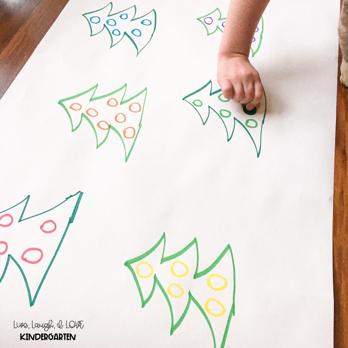 I drew trees and inside the tree, I drew colored circles.