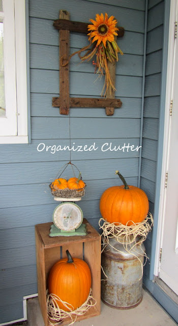 A Rustic and Vintage Fall Covered Patio - Organized Clutter