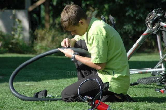 The Bicycle Mechanic: Mending a Punctured Tire Tube