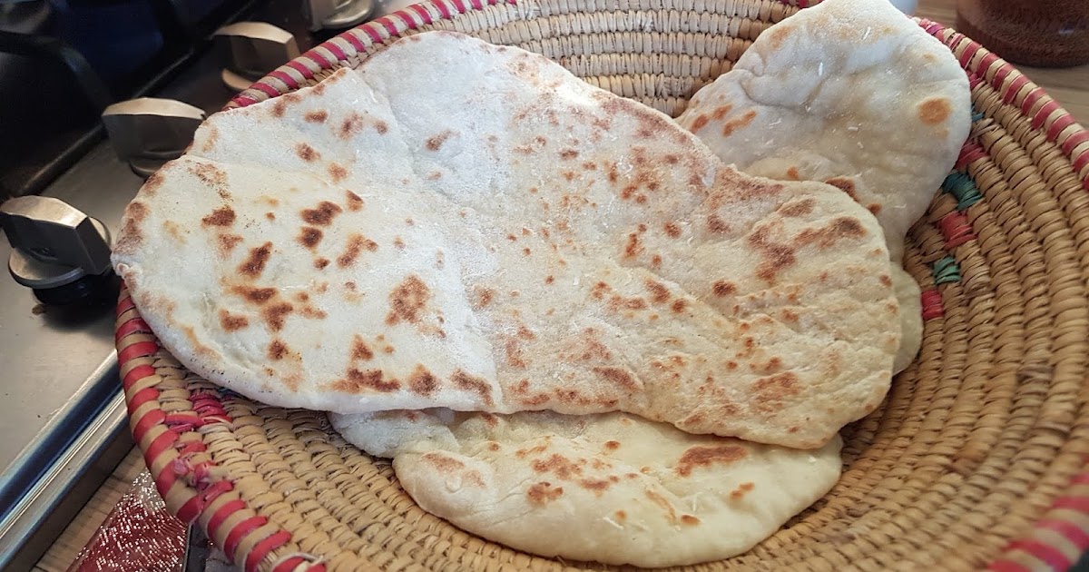 Fresh naan bread with curry
