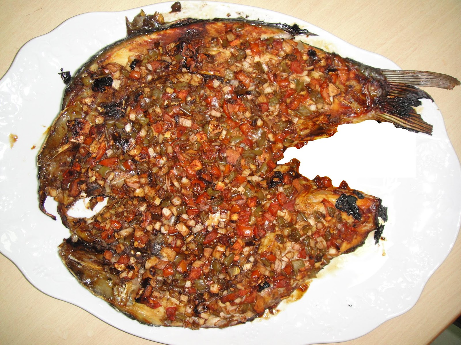 Maryam's Culinary Wonders: 180. Iraqi Whole Fish in Pomegranate Molasses