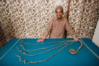 Man with world's longest fingernails gets them cut. - Premierlord ...