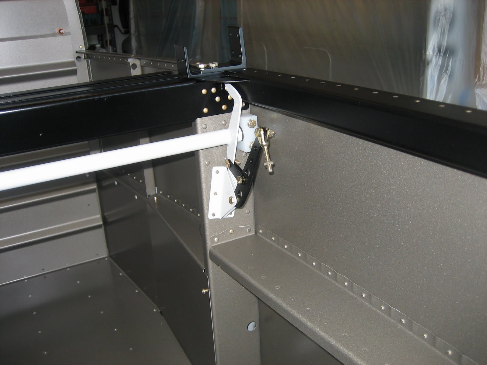 Chad and Bekah's RV-7: Canopy Side Rail riveting