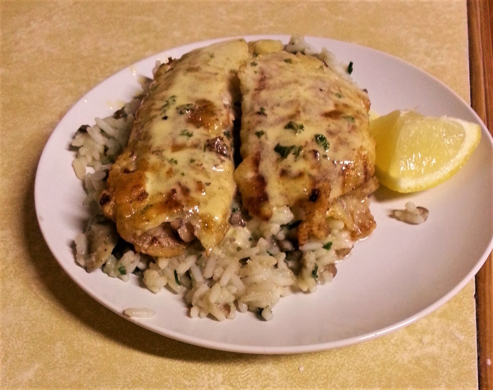 Garlic and herb hake with lentils and rice with a lemon butter sauce