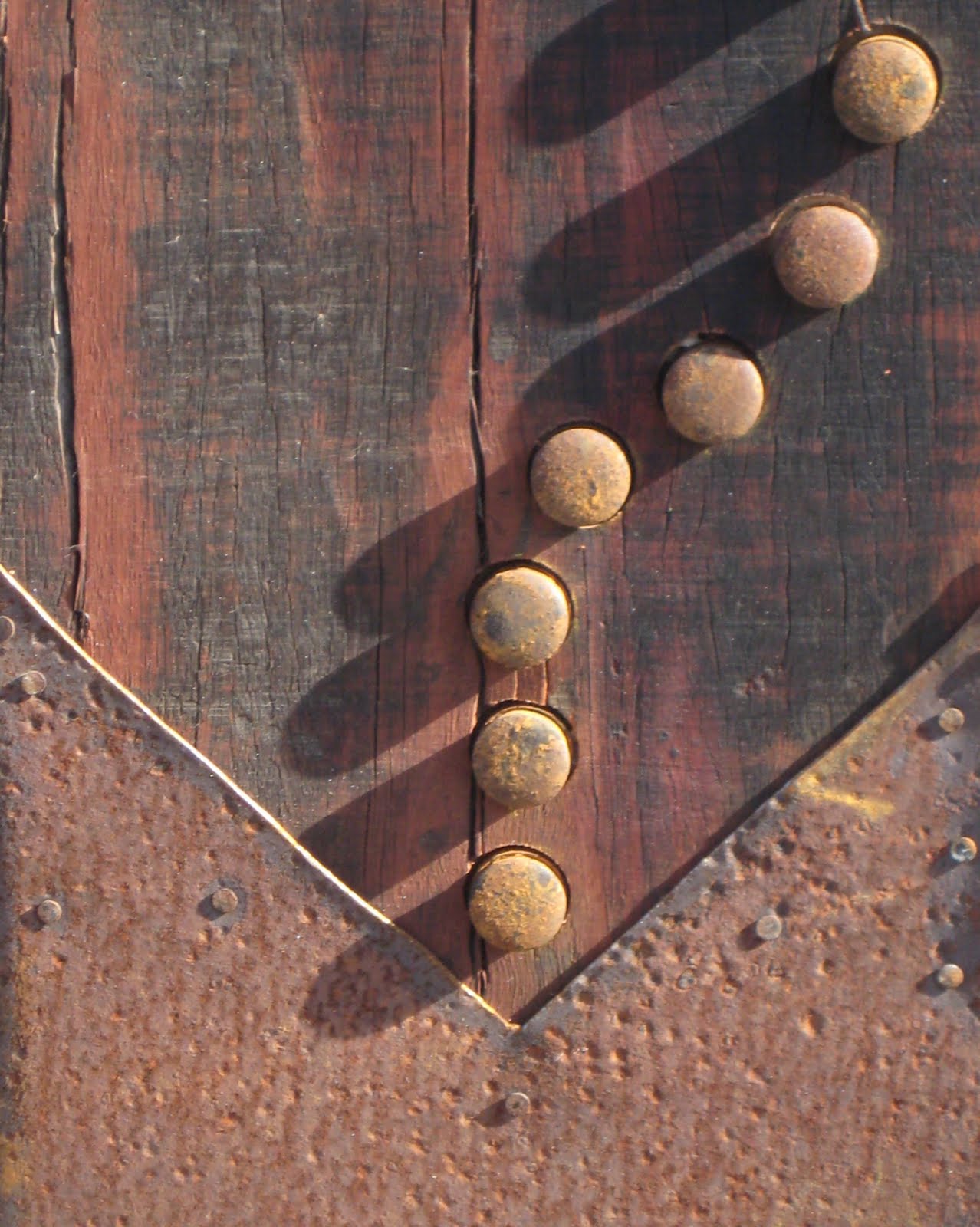 Rustnstuff: Steel (rusted) and timber post sculpture