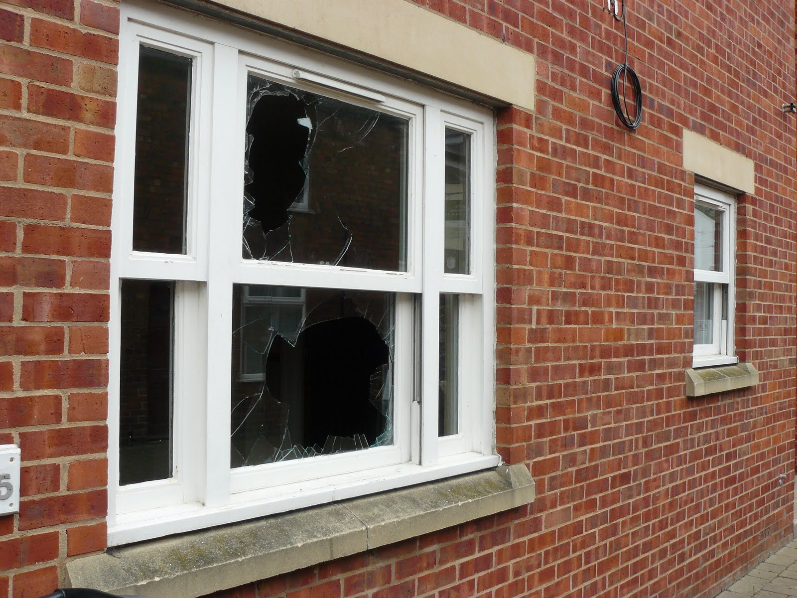 Martin Brookes Oakham: Windows of Gaol Street Home Smashed Oakham