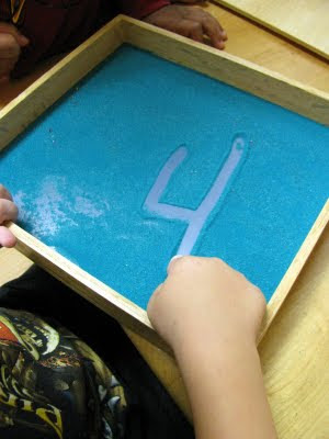 itty bitty love: writing in the sand