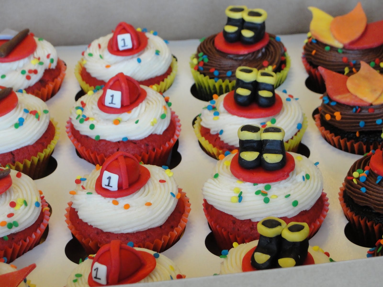Oh, just put a cupcake in it....: First Birthday Fireman Cake and Cupcakes.