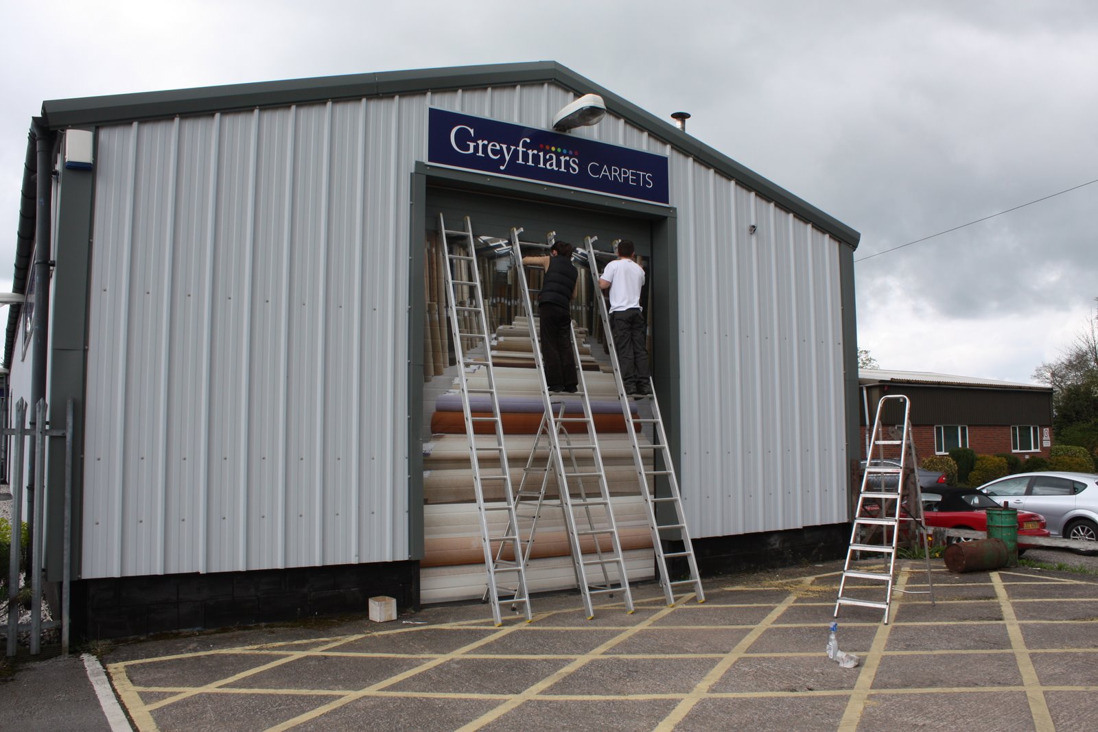 A Sign Makers Blog: Vinyl Wrapping a Roller Shutter Door