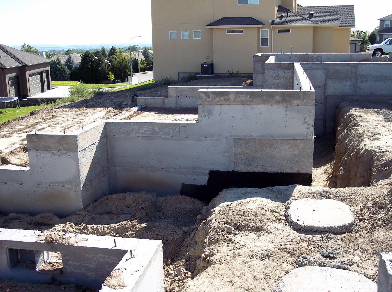 Building a Home: Foundation Walls Backfilled