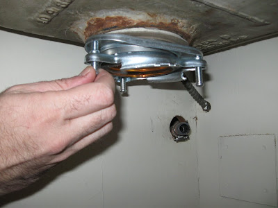 Just a girl with a hammer: The new garbage disposal!