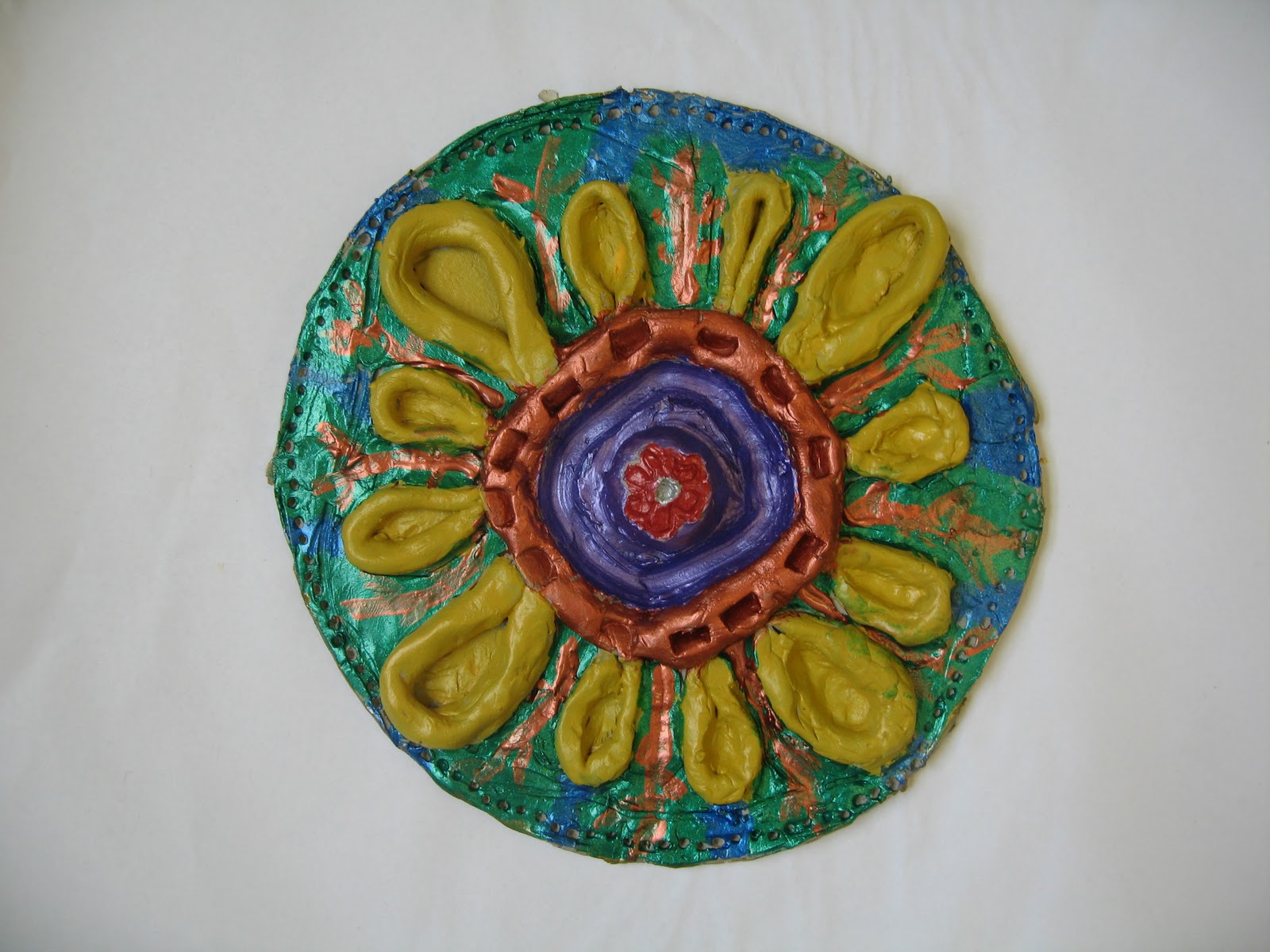 Color, collage, and much more: Clay Mandalas