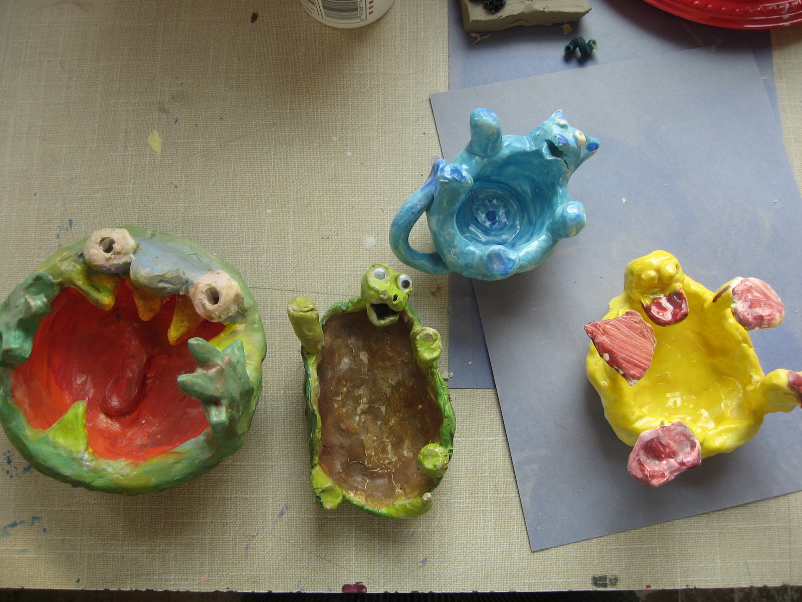 Color, collage, and much more: Funny Pinch Pot Characters