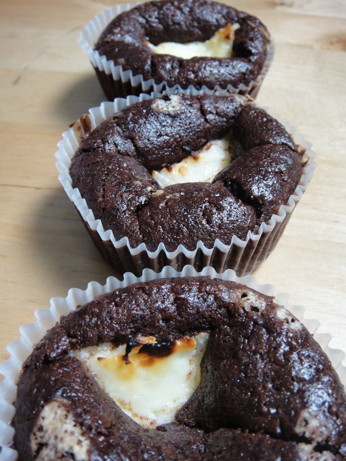 Crumbs and Cookies: black bottom cupcakes.