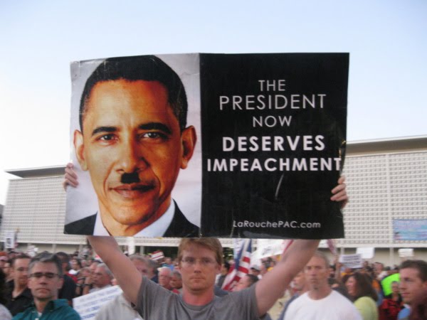 Communists Infiltrate Tea Party Protests– Wave Obama-Hitler Signs ...