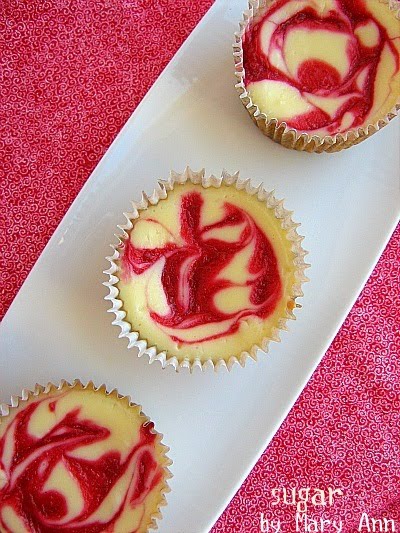 sugar: Raspberry Swirl Mini Cheesecakes