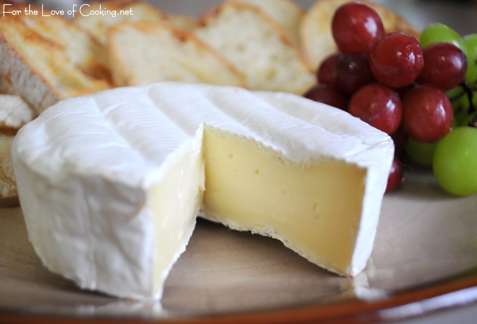 Brie served with Crostini and Grapes | For the Love of Cooking