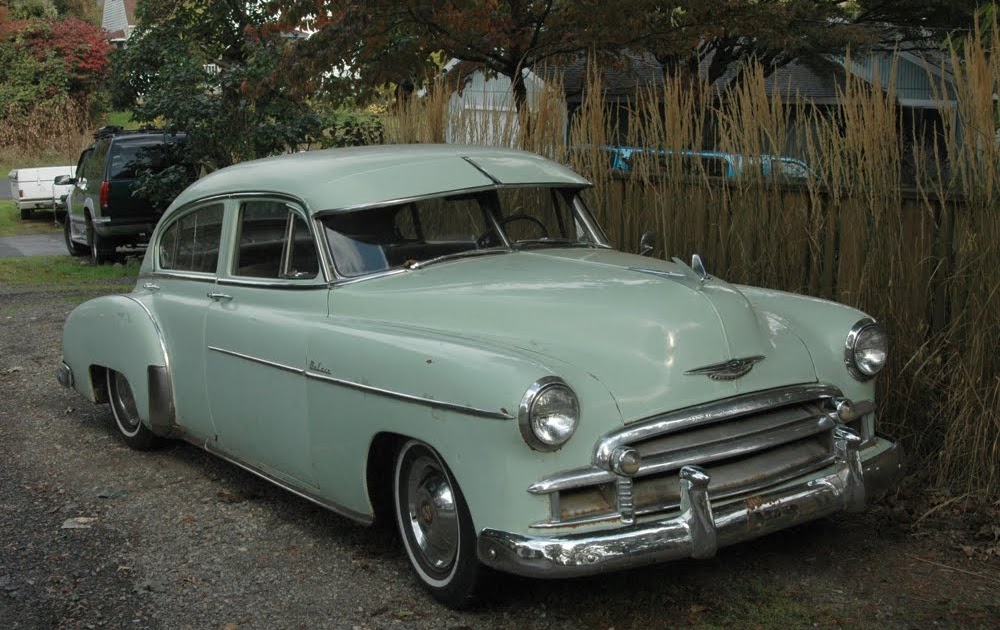 OLD PARKED CARS.: 1950 Chevrolet Deluxe Fastback.