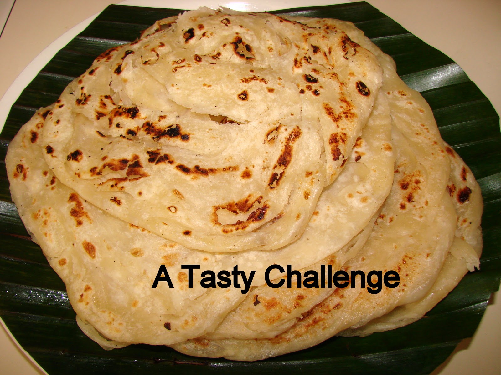 A Tasty Challenge.....: Kerala Parotta/ Porotta/ Borotta