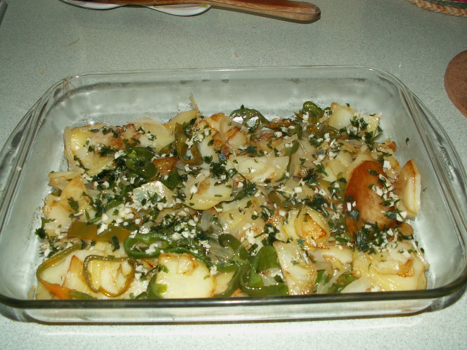 Pescado al horno con patatas panaderas