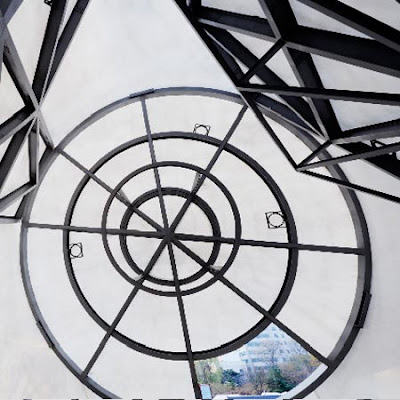 DeArasis: OMA's Rotating Pavilion - Prada Transformer