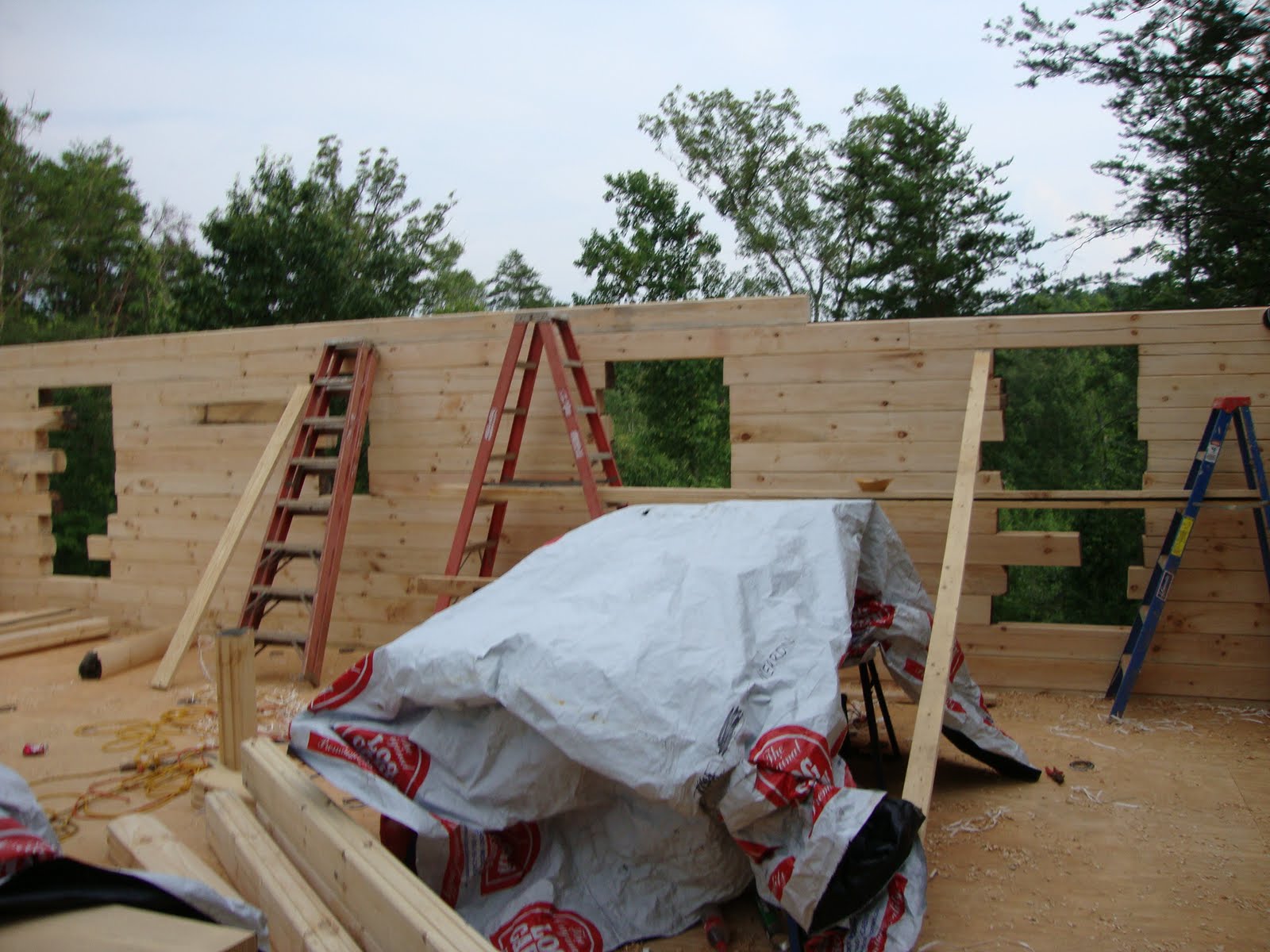 PATRIOT LOG HOME BUILDERS: How do I to begin a log stack process?
