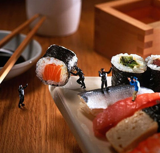 Tiny human figures on food transformed into landscapes