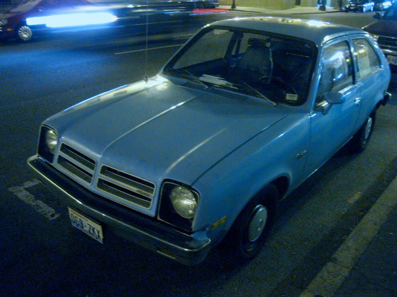 OLD PARKED CARS.: 1977 Chevrolet Chevette Hatchback.