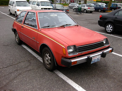 OLD PARKED CARS.: 1979 Dodge Colt Hatchback.