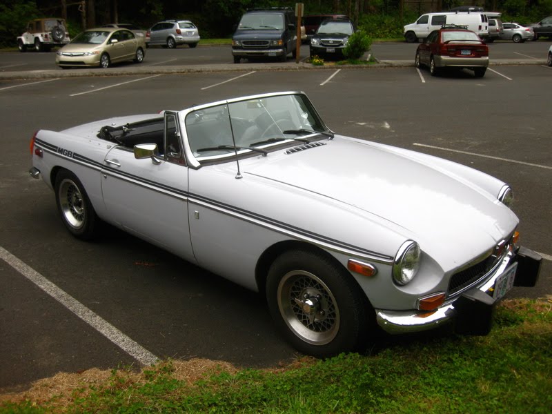 OLD PARKED CARS.: 1973 MG MGB Roadster.