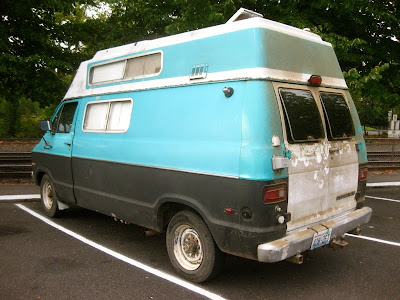 OLD PARKED CARS.: 1973 Dodge Tradesman 300 Travco Travel-Wagon.
