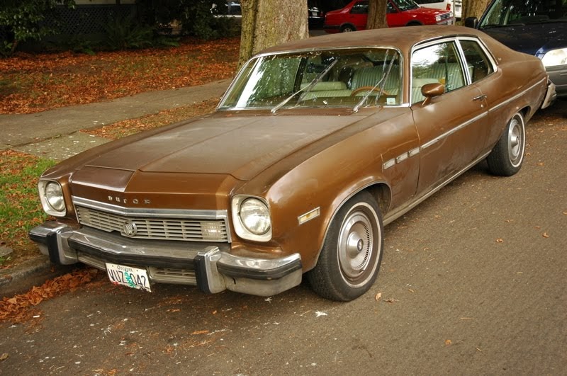 OLD PARKED CARS.: 1974 Buick Apollo.